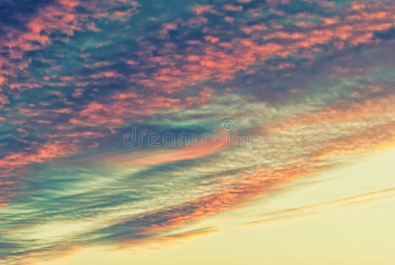 Striped sky at sunset stock photo. Image of saturated - 115150298