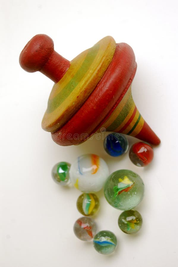 Striped Wooden Top and Glass Marbles Stock Image - Image of retro ...