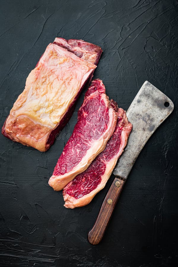 Striploin Steak, Raw Beef Butchery Cut, on Black Background, Top View ...
