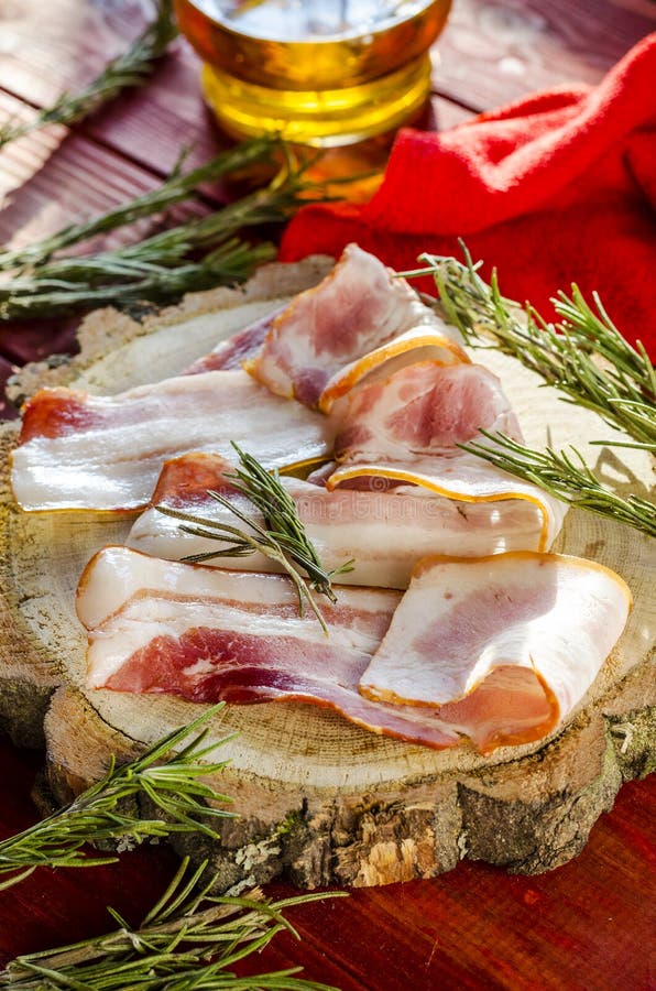 Strips of Fresh Bacon on a Board Stock Photo - Image of snack, rustic ...