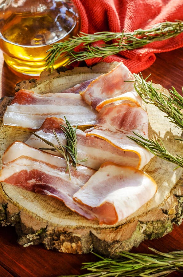 Strips of Fresh Bacon on a Board Stock Photo - Image of snack, spices ...