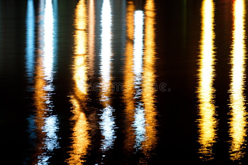 Strips of Light in the Reflection on the Water Stock Photo - Image of ...