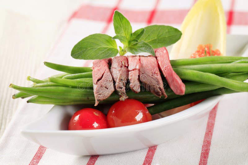 Strips of Roast Beef and String Beans Stock Photo - Image of beans ...