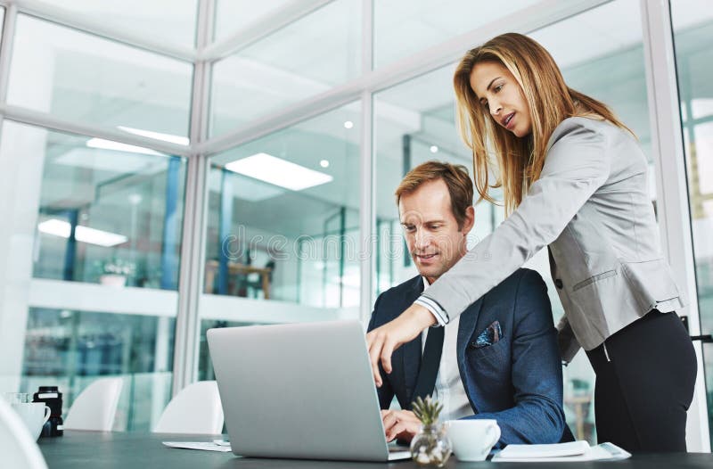 We Strive To Come Up with Immediate Solutions. Two Businesspeople ...