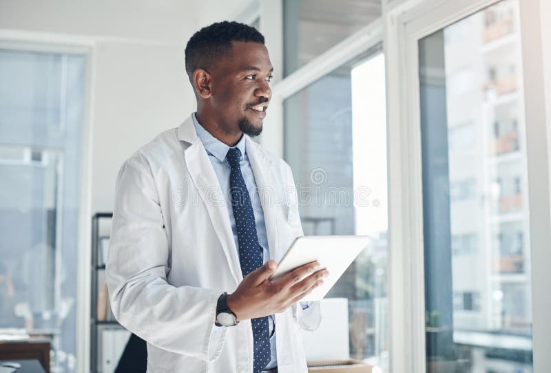 Always Strive To Reach Your Goals. a Young Doctor Using a Digital ... Always Strive To Reach Your Goals. a Young Doctor Using a Digital ...
