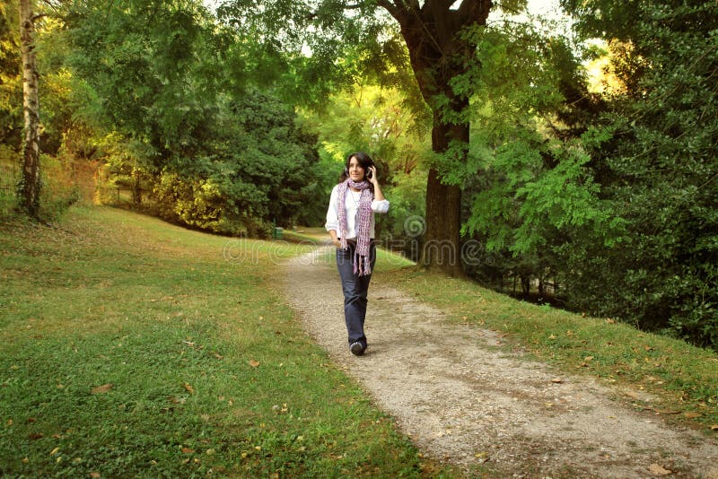 Stroll in the park stock image. Image of outdoor, headphones - 11434247
