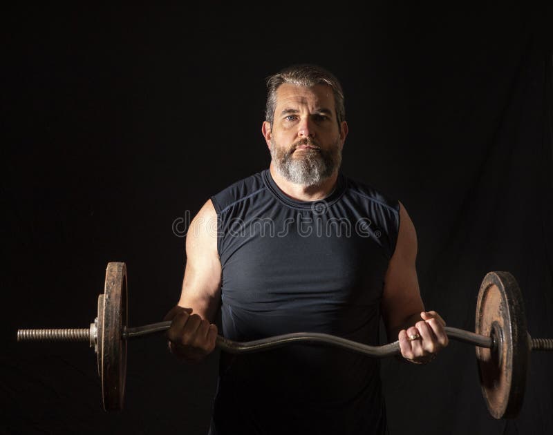 Strong, Active, Middle Aged Man with Gray Beard Lifting Heavy Weights ...