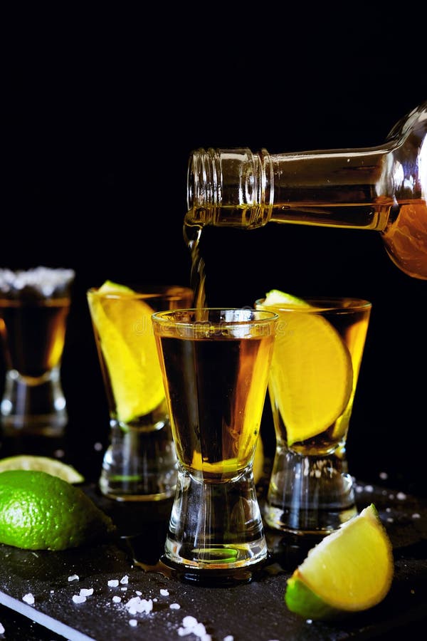 Strong Alcohol Drinks. Tequila Shots with Salt and Lime Slices. Stock ...