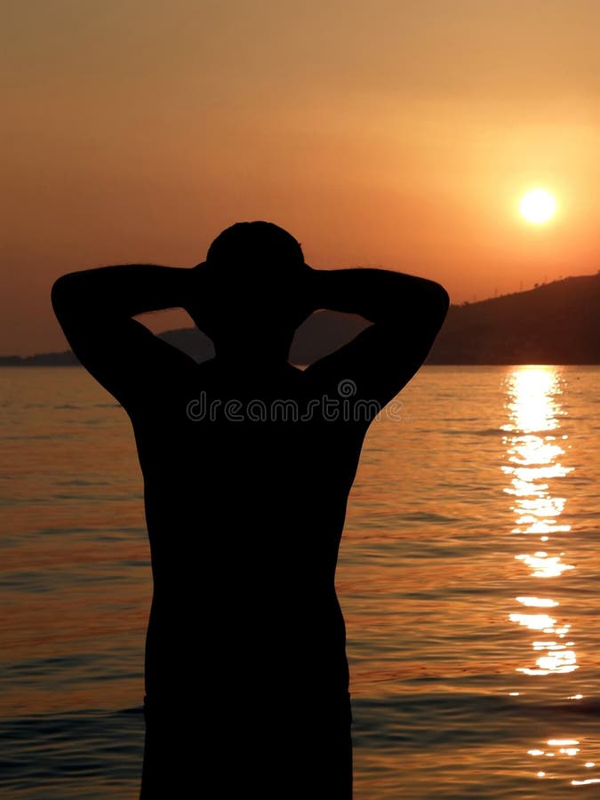 Male Silhouette at Sunset stock image. Image of gaze, look - 759211