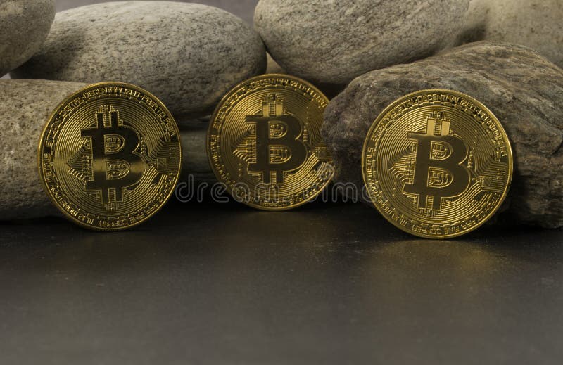 Bitcoins solid as a rock stock image. Image of gold - 110942567