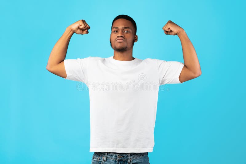Strong Black Guy Showing Biceps Posing on Blue Background Stock Image ...