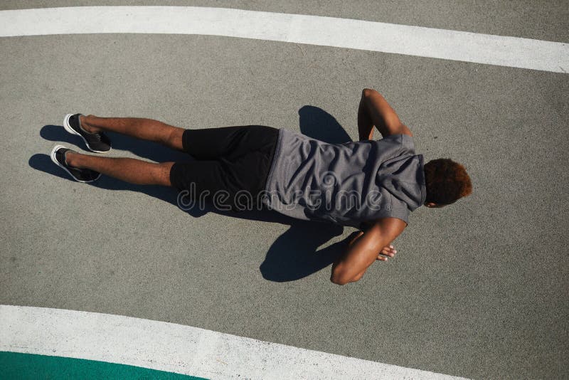 Strong Black Man Doing Push-ups on Ground Stock Photo - Image of ...