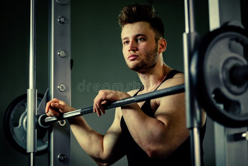 Strong Bodybuilder Athlete with Heavy Weights in Gym Stock Photo ...
