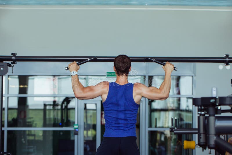 Strong Bodybuilder Exercising in a Gym Stock Image - Image of losing ...