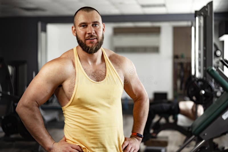 Strong Bodybuilder with Muscular Chest and Shoulders in Gym Stock Image ...