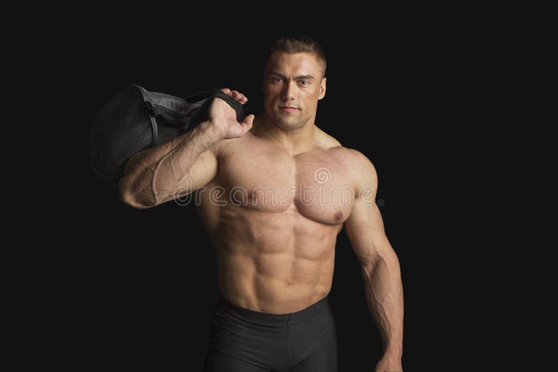 Strong Bodybuilder with Six Pack on Black Stock Image - Image of goals ...
