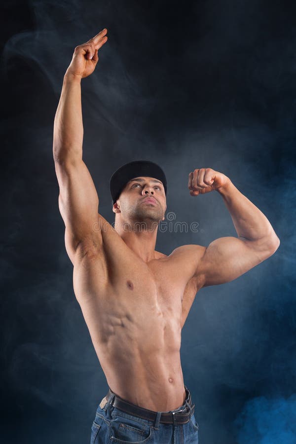 Strong Bodybuilder Strains His Powerful Muscles Stock Image - Image of ...