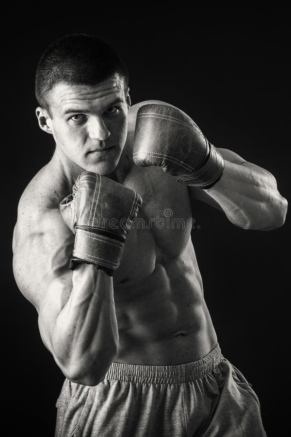 Strong Boxer on a Black Background Stock Photo - Image of competition ...