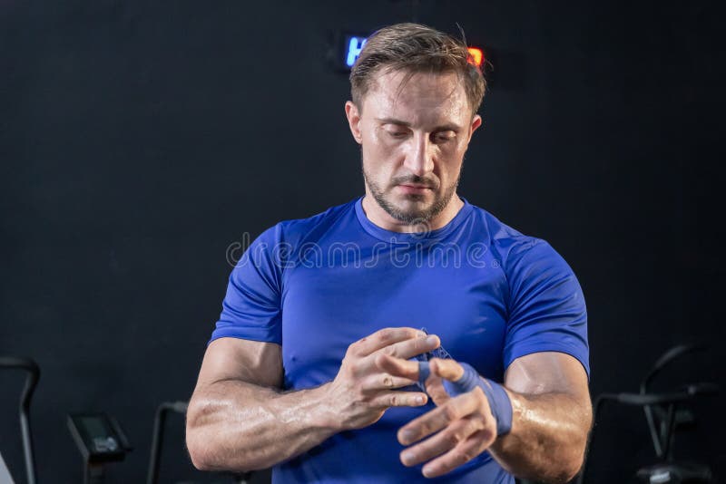 Strong Boxer Man Wrap Hands Protection Knuckle, Man is Wrapping Hands ...