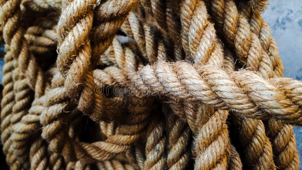 A Strong Brown Rope, Fasten with a Rope Stock Image - Image of wood ...