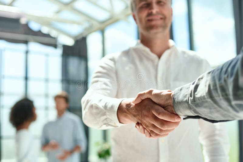 Strong Business Handshake in the Office. Close-up. Stock Photo - Image ...