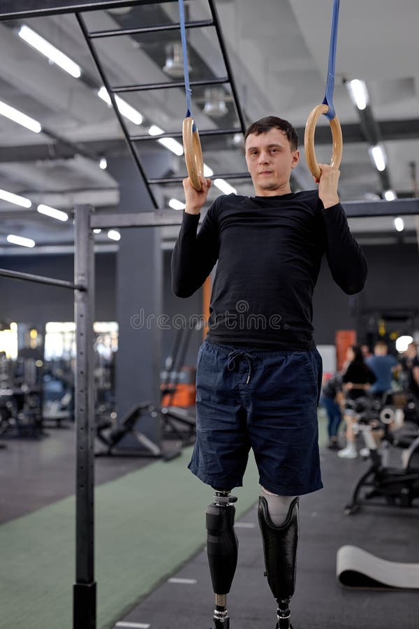 Strong Confident Man with Leg Prothesis Training on Gymnastic Rings ...