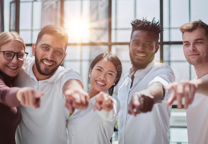 Portrait of Successful Creative Business Team Looking at Camera and ... Portrait of Successful Creative Business Team Looking at Camera and ...