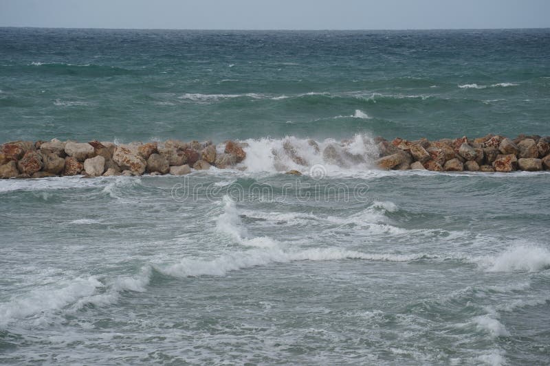 Strong Currents and Waves in the Sea. Waves Successfully Crash into the ...