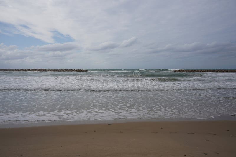 Strong Currents and Waves in the Sea. Waves Successfully Crash into the ...