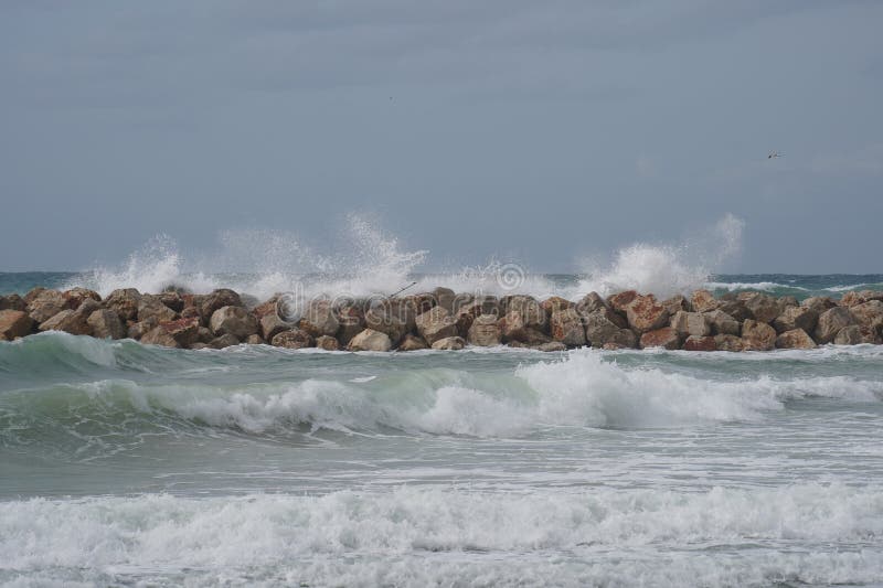 Strong Currents and Waves in the Sea. Waves Successfully Crash into the ...