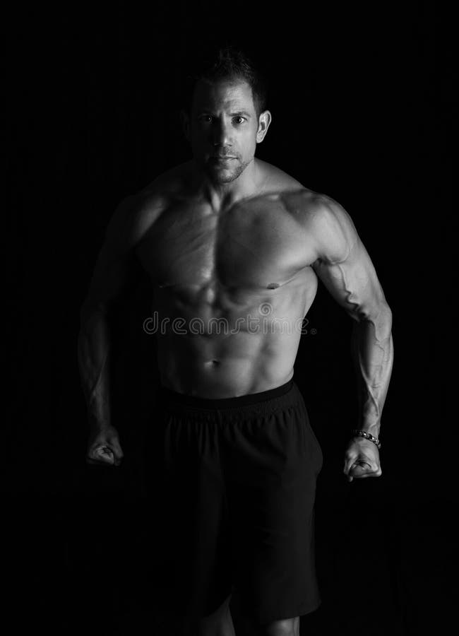 Strong fitness man flexing stock photo. Image of muscle - 32165036