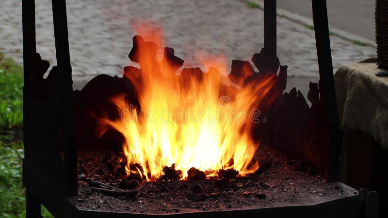 A Strong Flame of Red-orange Fire in the Blacksmith`s Forge. Stock ...