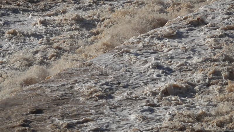 Strong Flow of Water and Mud on a Riverbed, in Slow Motion Stock ...