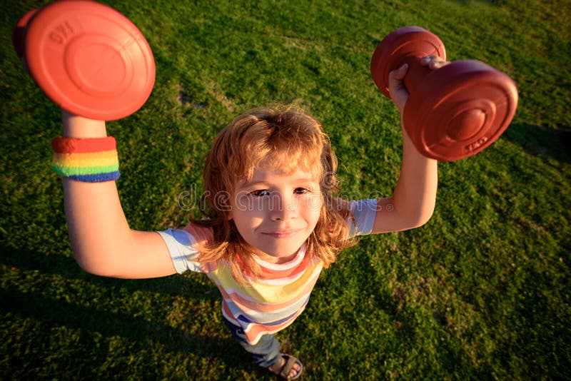Strong Funny Little Boy. Child with Dumbbells. Stock Image - Image of ...