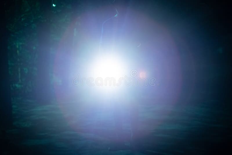 Strong Hand Light Torch Ray Stroke in Your Face at Nights Stock Photo ...