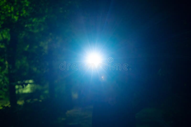 Strong Hand Light Torch Ray Stroke in Your Face at Nights Stock Photo ...
