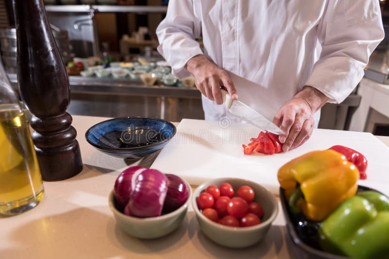 Strong Hands of the Chef Cutting Paper in the Kitchen Stock Photo ...