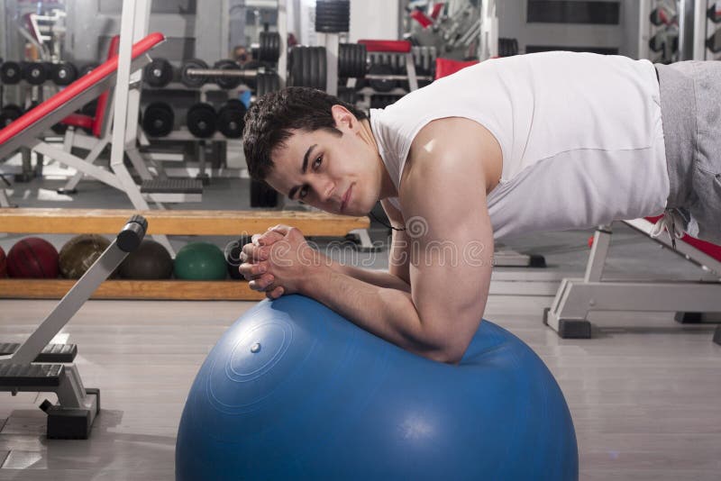 Strong Handsome Man Exercising at the Gym Stock Image - Image of adult ...