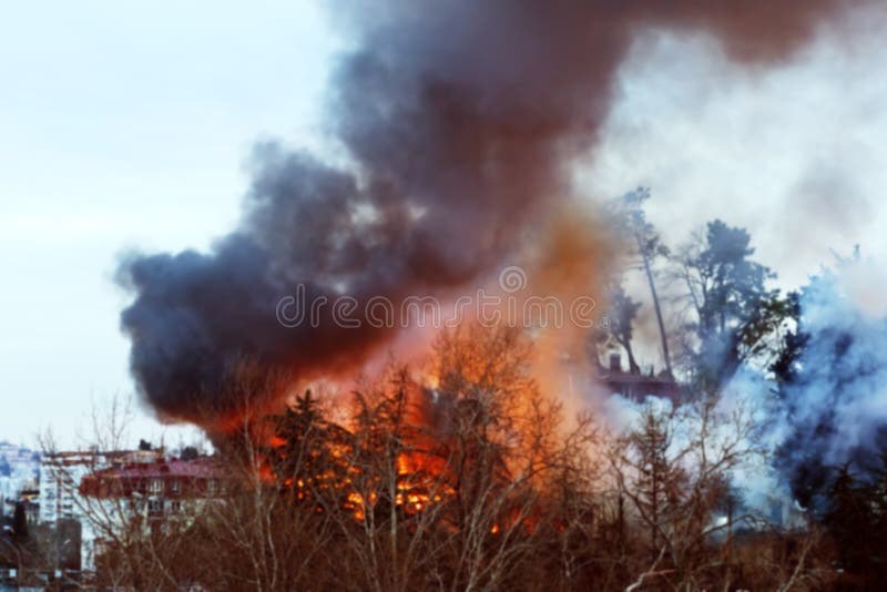 Strong House Fire, Fire and Black Column of Smoke. Blurred Image Stock ...