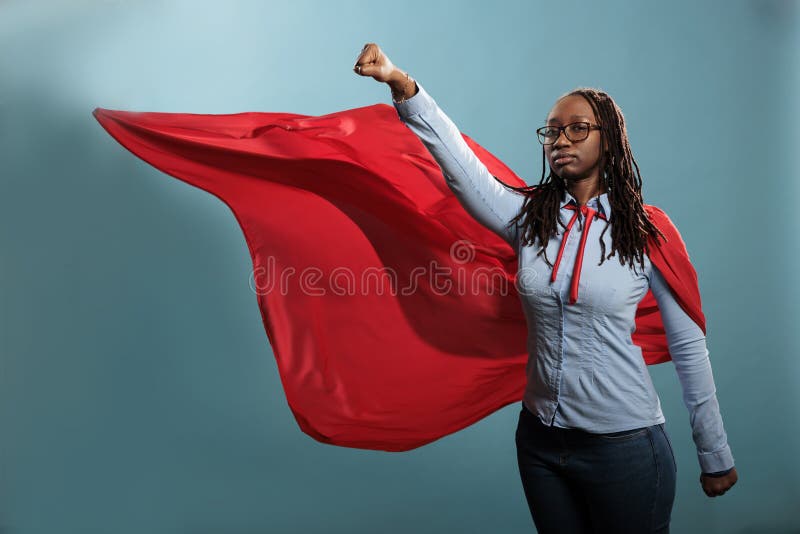 Strong Justice Defender with Superpowers Looking at Camera with Fist in ...