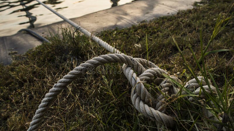 Strong Knot of Heavy Rope Near the River. Stock Image - Image of anchor ...