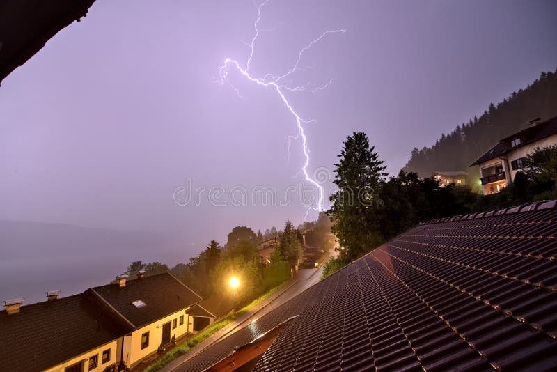 Strong Lightning Strike at Night in the Mountains of Austria during a ...