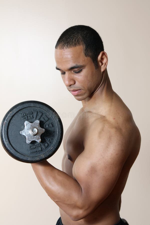 Strong Male Lifting Dumbbell Stock Photo - Image of macho, body: 10271802