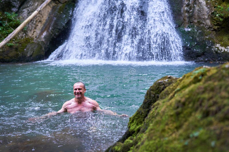 Strong Man Bathing in a Waterfall Stock Photo - Image of cold ...