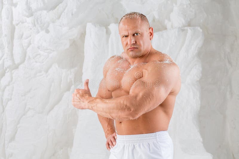 A Strong Man with Big Muscles Showing Thumbs Stock Image - Image of ...