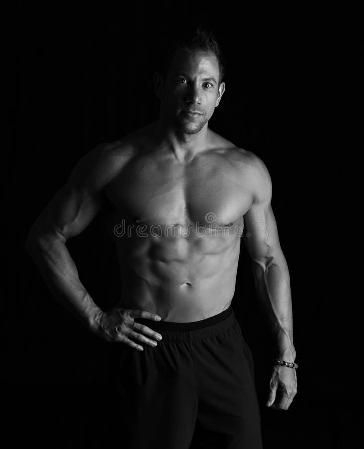 Strong fitness man flexing stock photo. Image of muscle - 32165036