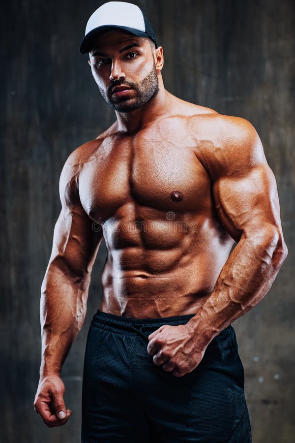 Strong man bodybuilder stock image. Image of bodybuilder - 130613007