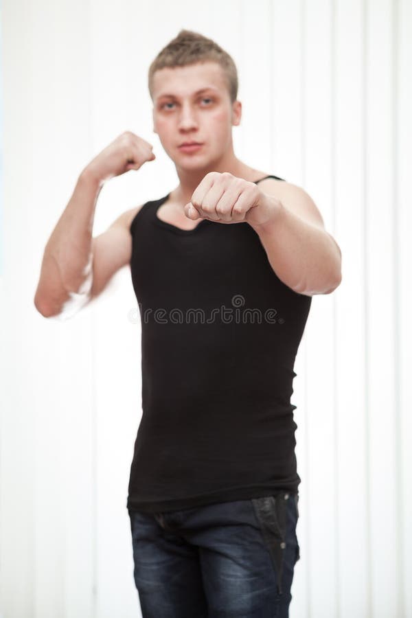 Strong Man in Boxing Pose Standing on White Background Stock Image ...