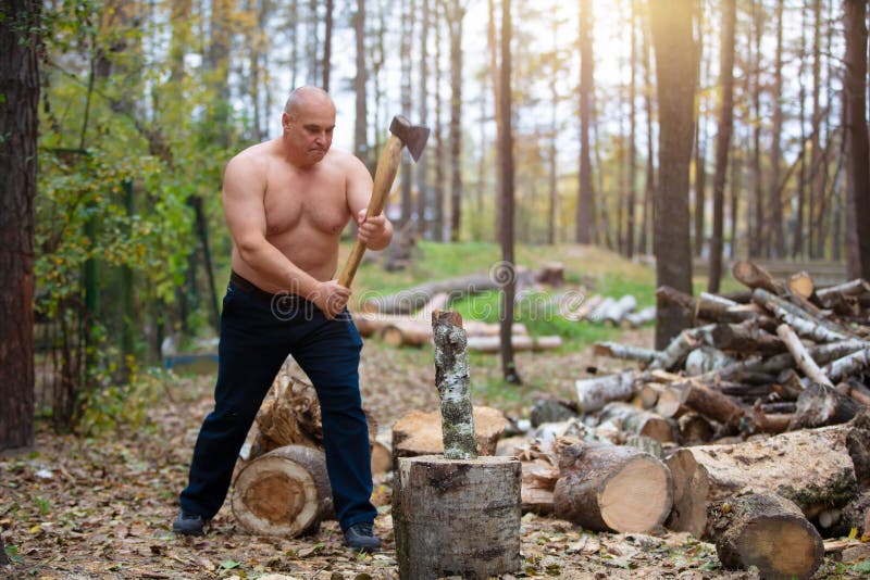 A Strong Man Chopping Wood. Stock Photo - Image of skilled, caucasian ...