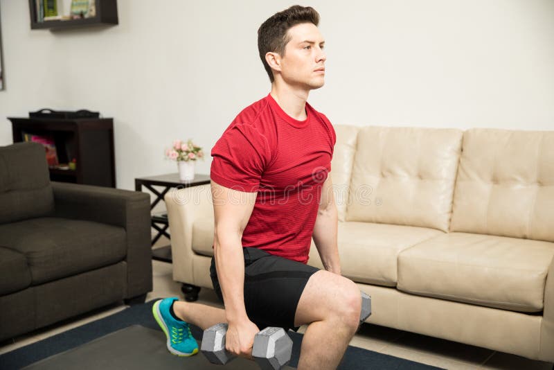 Strong Man Doing Kneeling Lunges at Home Stock Image - Image of ...